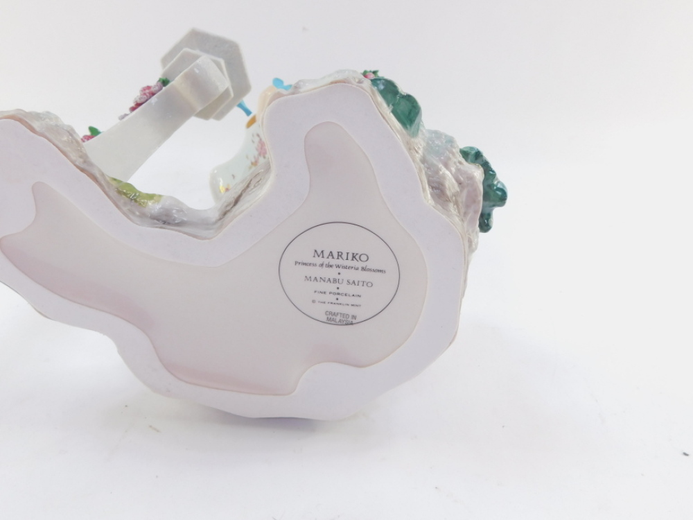 A Franklin Mint porcelain figure modelled as Mariko, Princess of The ...