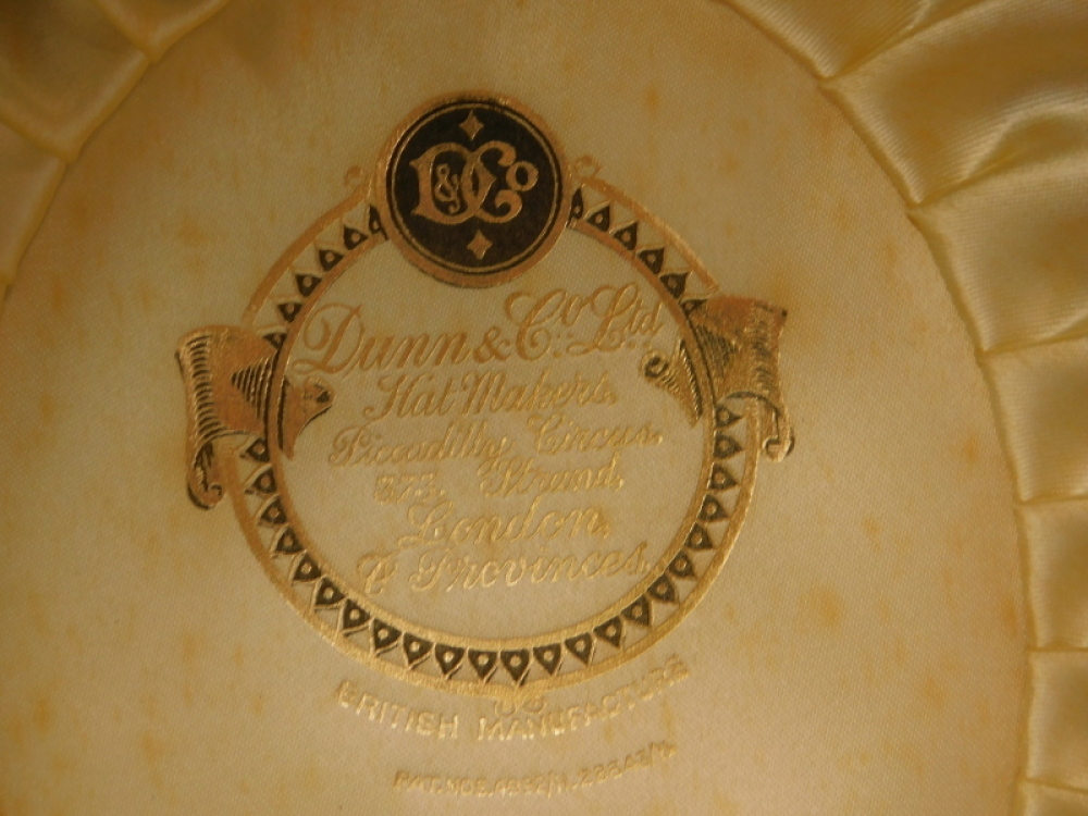 A Dunn and Co bowler hat, label to inside, numbered 400, 758.