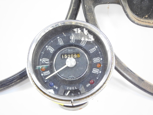 A Smith's vintage dashboard speedometer, with mileometer and fuel gauge ...