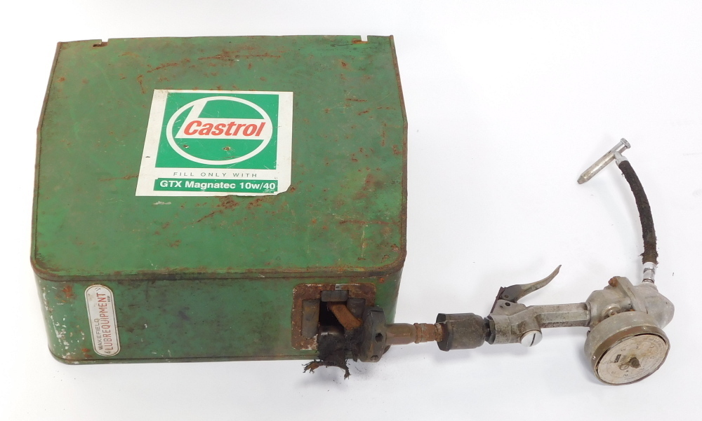 A Castrol Wakefield Lubrequipment garage oil dispenser.