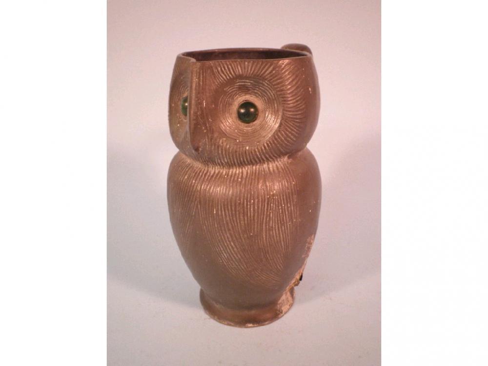 A Liberty Tudric pewter owl jug