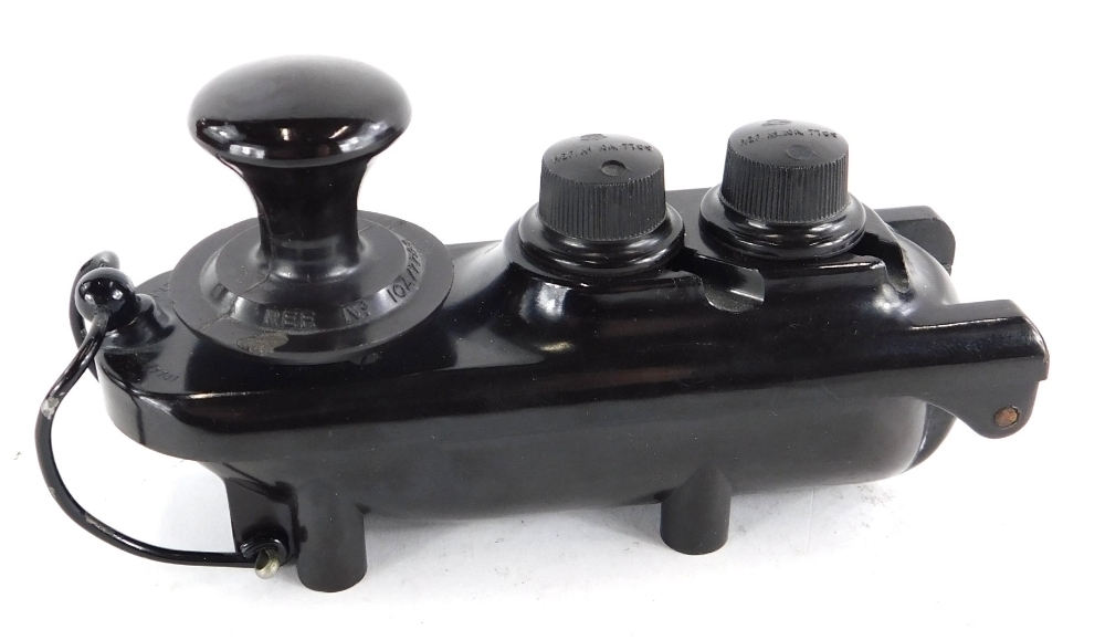 A Lancaster Bomber Bath shaped Bakelite Morse code key.