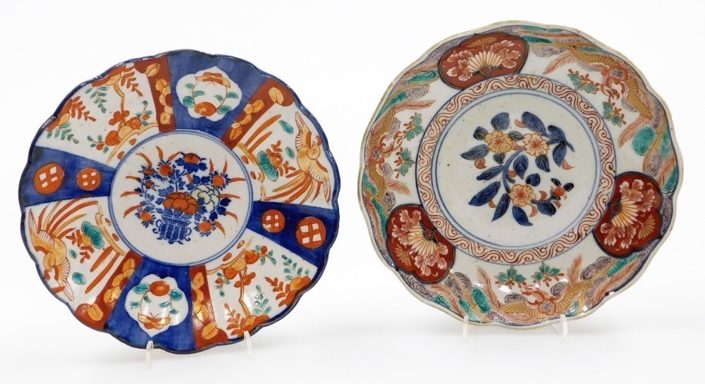 A Japanese Imari plate, decorated in enamels with floral roundels ...