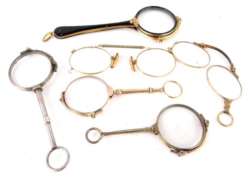 A collection of pince nez spectacles, some with gold coloured frames, etc.