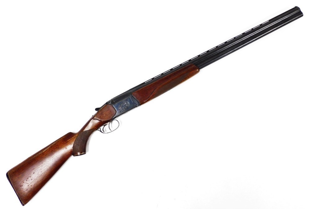 A Baikal double barrel 12 bore under/over shotgun, serial number P18622 ...