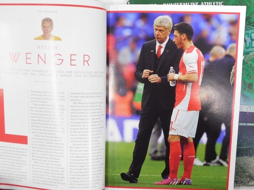 A large quantity of framed and signed footballing related photographs ...