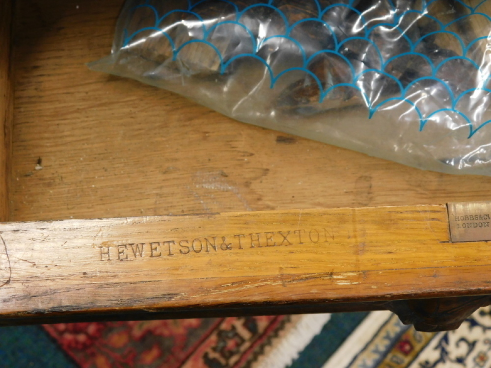 A Victorian carved oak library table in the manner of Pugin, the ...