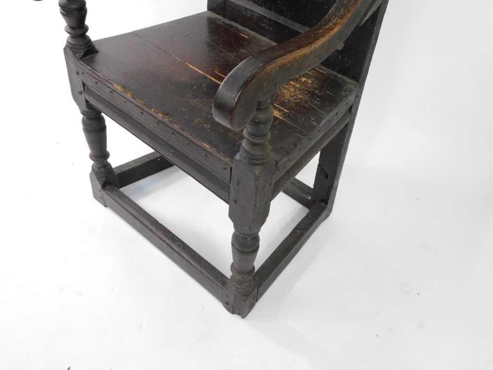 A 17thC and later Wainscot chair, with scrolling cresting rail and ...