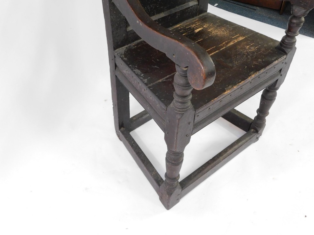 A 17thC and later Wainscot chair, with scrolling cresting rail and ...