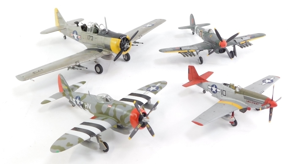 Four built and painted model aircraft, including a Spitfire, and three ...