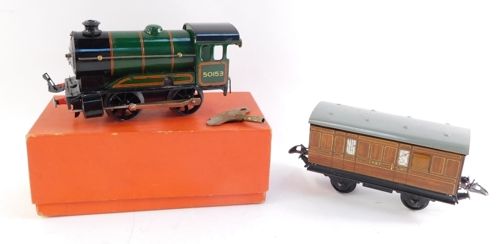 A Hornby Trains O gauge tin-plate clockwork locomotive, 50153 and a ...