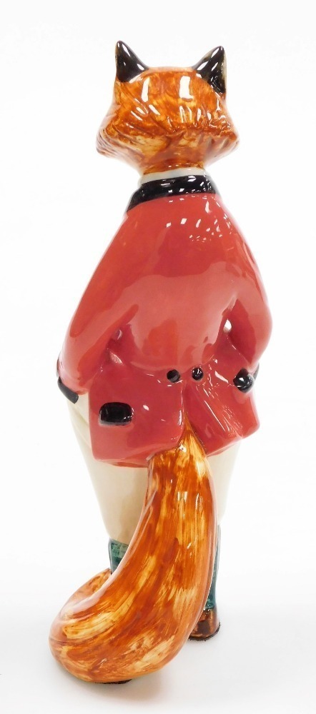 A Rye pottery fox figure, of a gentleman fox in red waistcoat, signed ...
