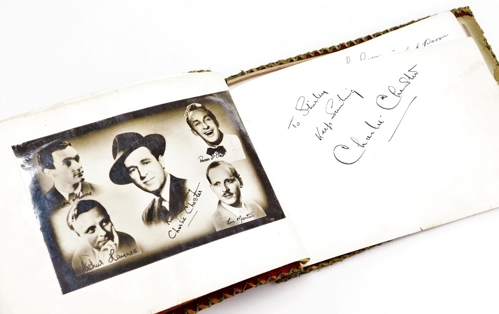 An autograph book bearing various signatures of Manchester United FA ...