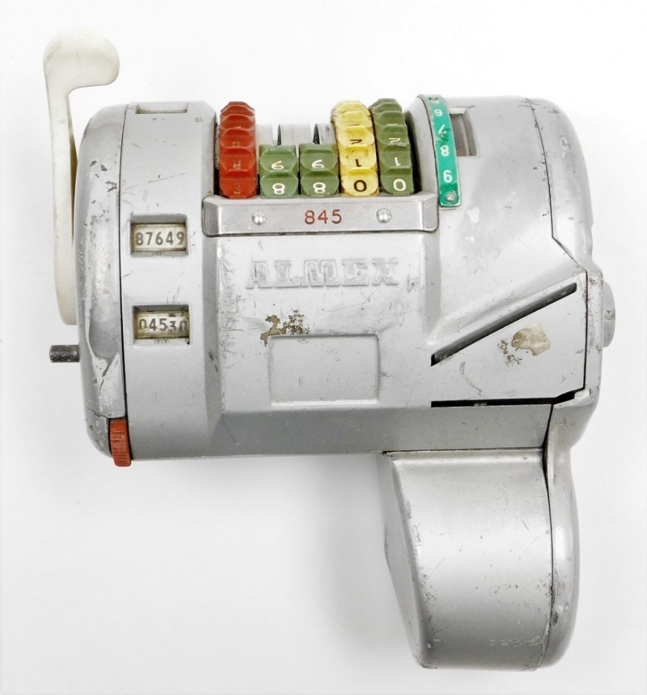 An Almex bus or tram ticket machine, no 845, serial no 2204 216330, and ...