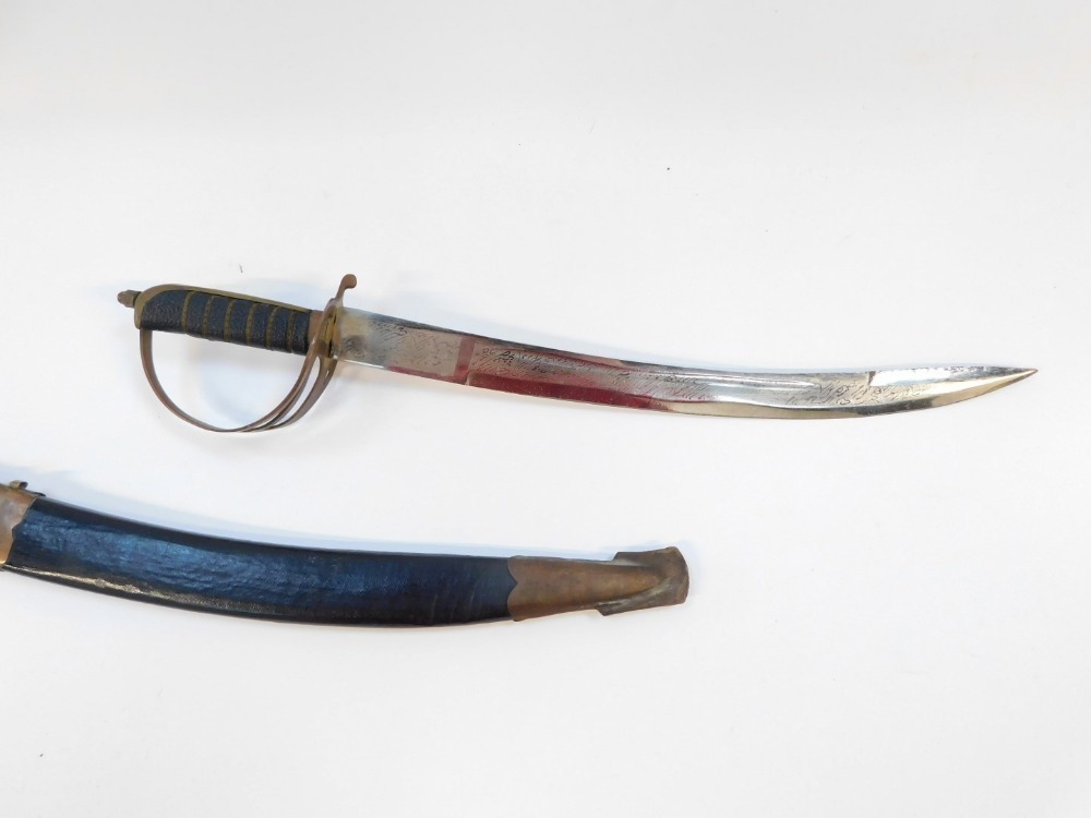 An Indian short sword, with engraved blade, and wire bound leather grip ...