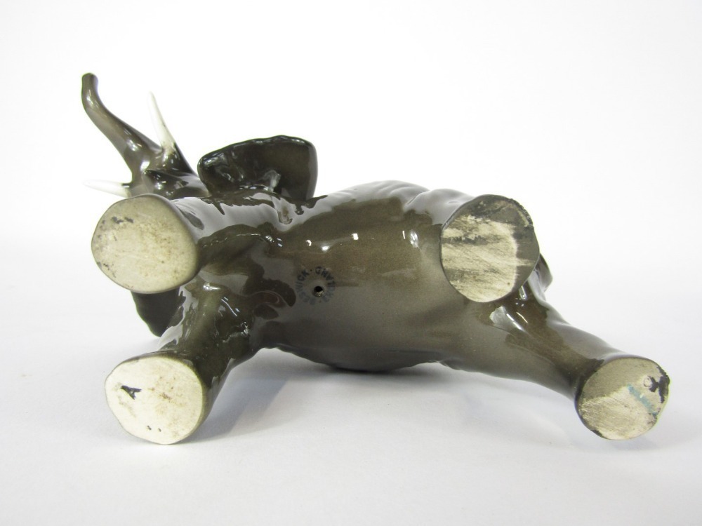 A Beswick model of an Elephant, with short trunk and two tusks, black ...