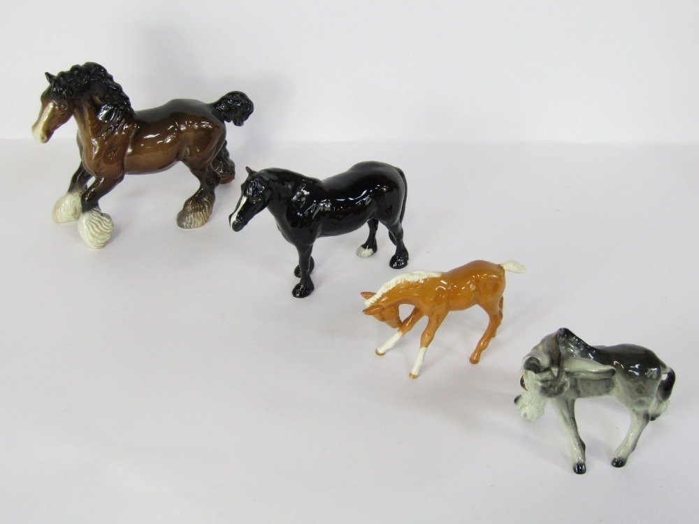 A group of horse and donkey figures, comprising a Beswick palomino ...