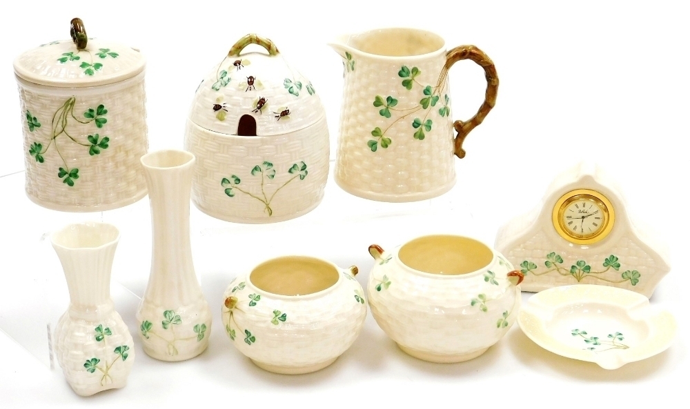 A group of Belleek pottery decorated in the Shamrock pattern, various ...