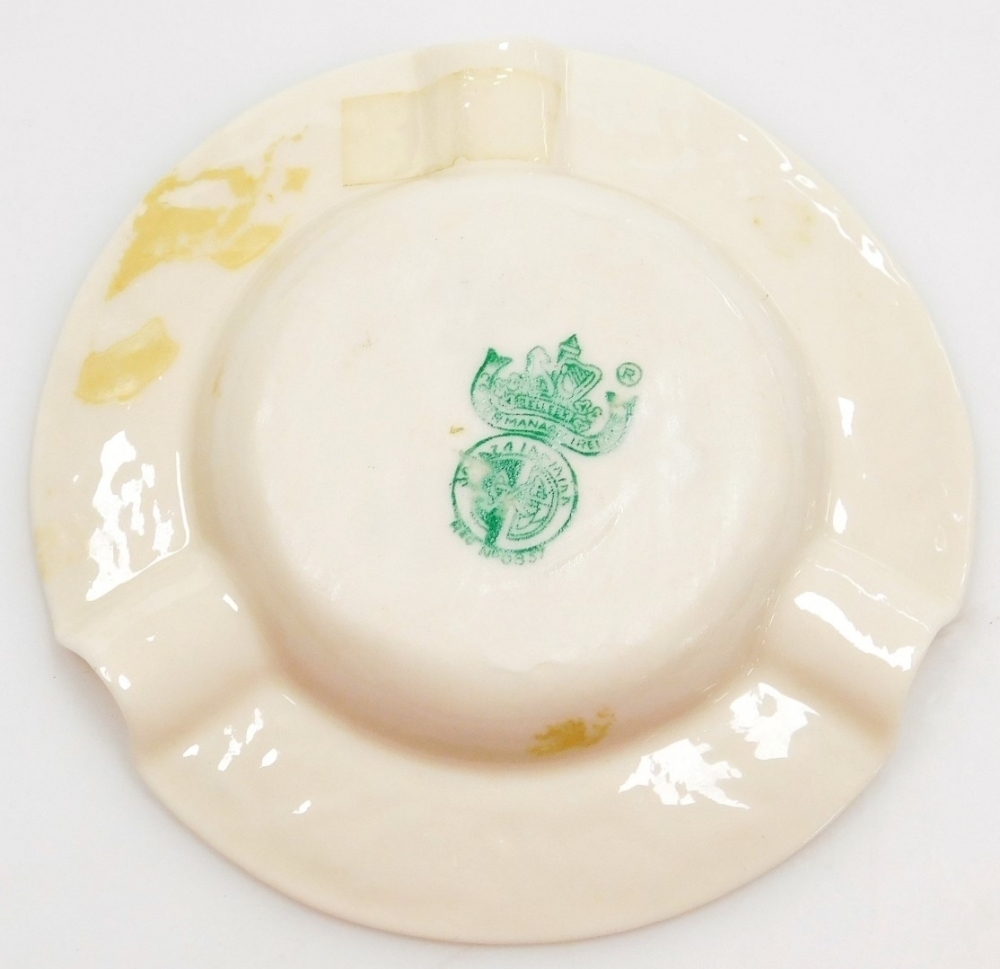 A group of Belleek pottery decorated in the Shamrock pattern, various ...