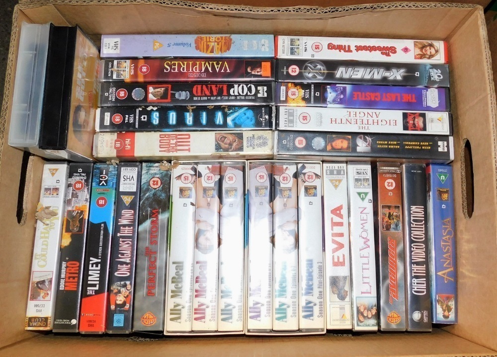 Various VHS tapes, to include Matrix Reloaded, Golden Eye, Fish Called ...