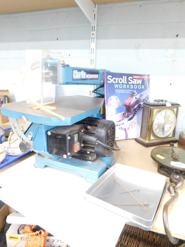 A Clarke woodworker, 16inch, scroll saw, model number CSS400B.