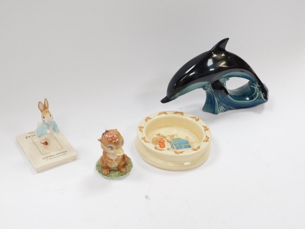 A Poole Pottery dolphin, a David Hand Animaland Dinkum Platypus figure ...