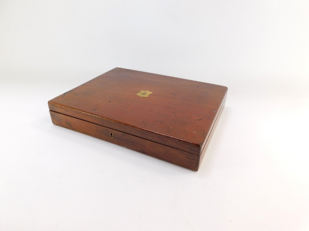 A cased set of twelve silver plated knives and forks, each with a ...