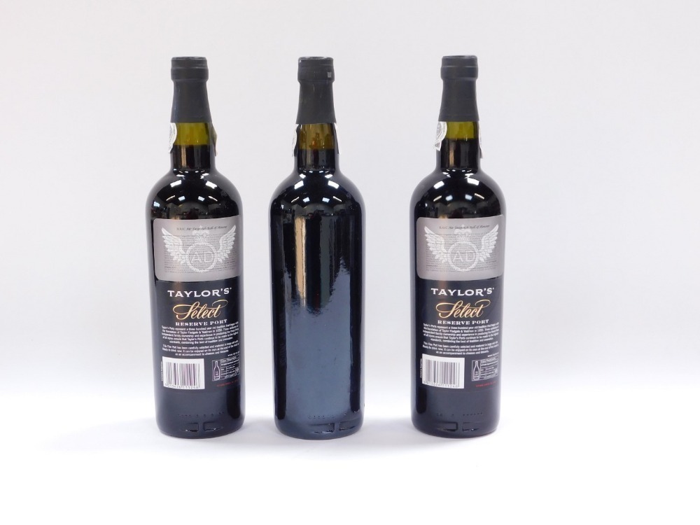 Two bottles of Taylor Fladgate Port, each with commemorative labels for ...