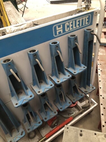 A Celette body jig, with beams and towers and a Calman dozer.