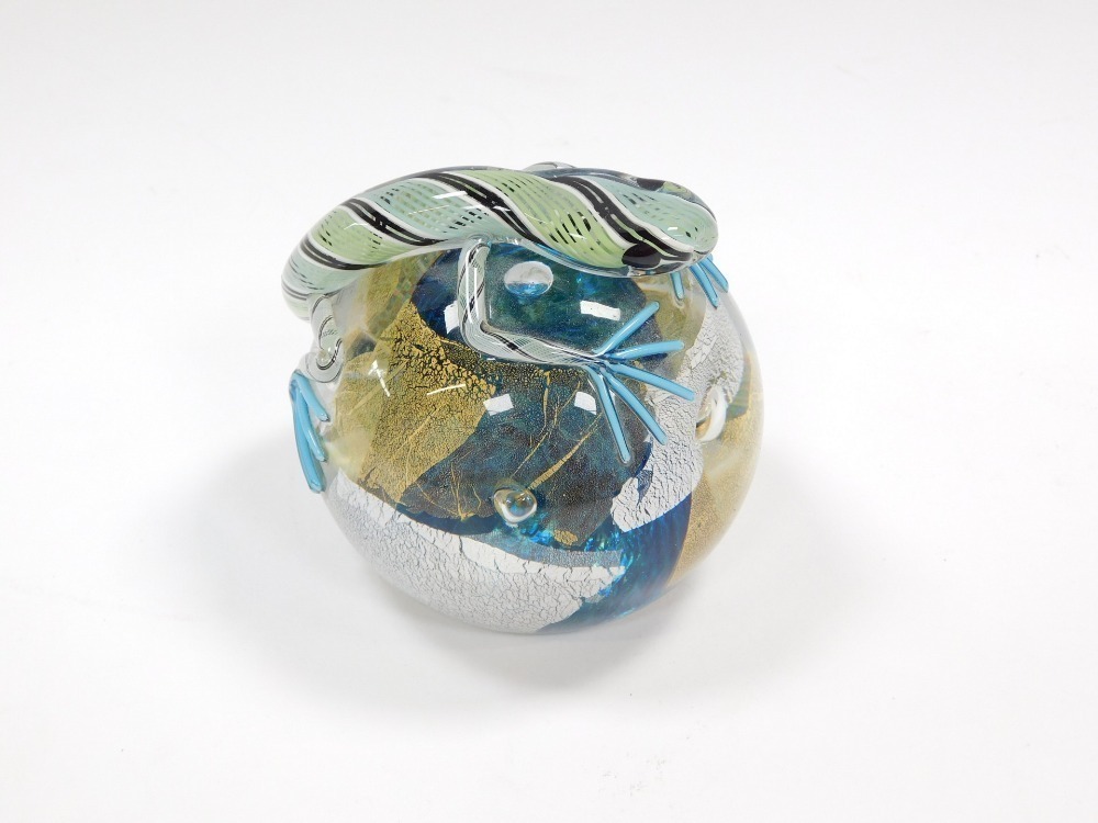 A Twists glass paperweight, designed by Mike Hunter, moulded over the ...