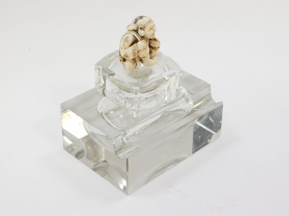 A Victorian cut glass inkwell, of rectangular section, the lid later ...