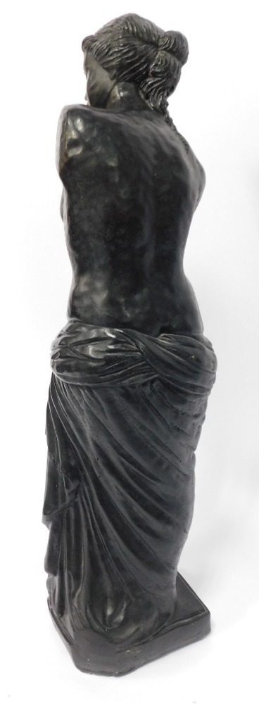 A black painted plaster figure of the Venus de Milo, on a rectangular ...