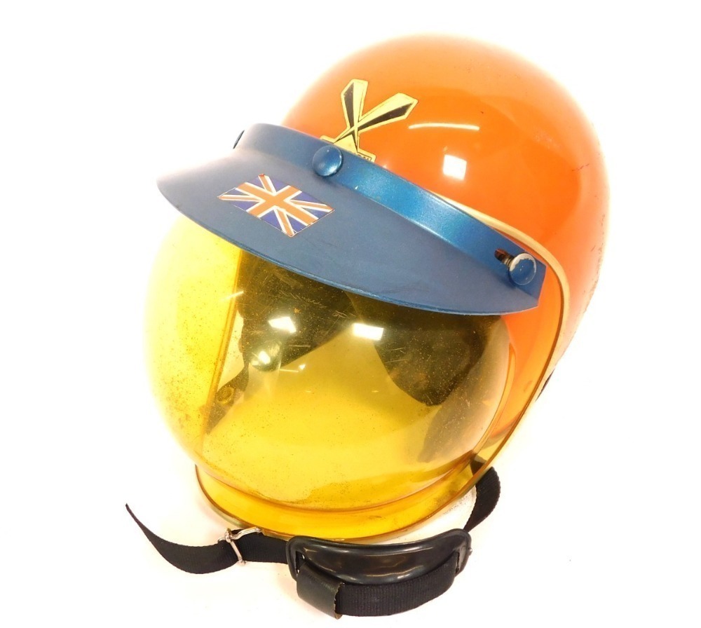Vintage motorcycle crash helmet, with Centurion label, yellow perspex ...