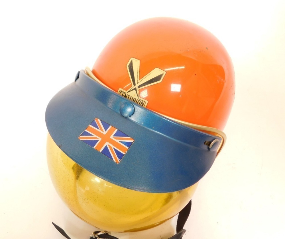 Vintage motorcycle crash helmet, with Centurion label, yellow perspex ...