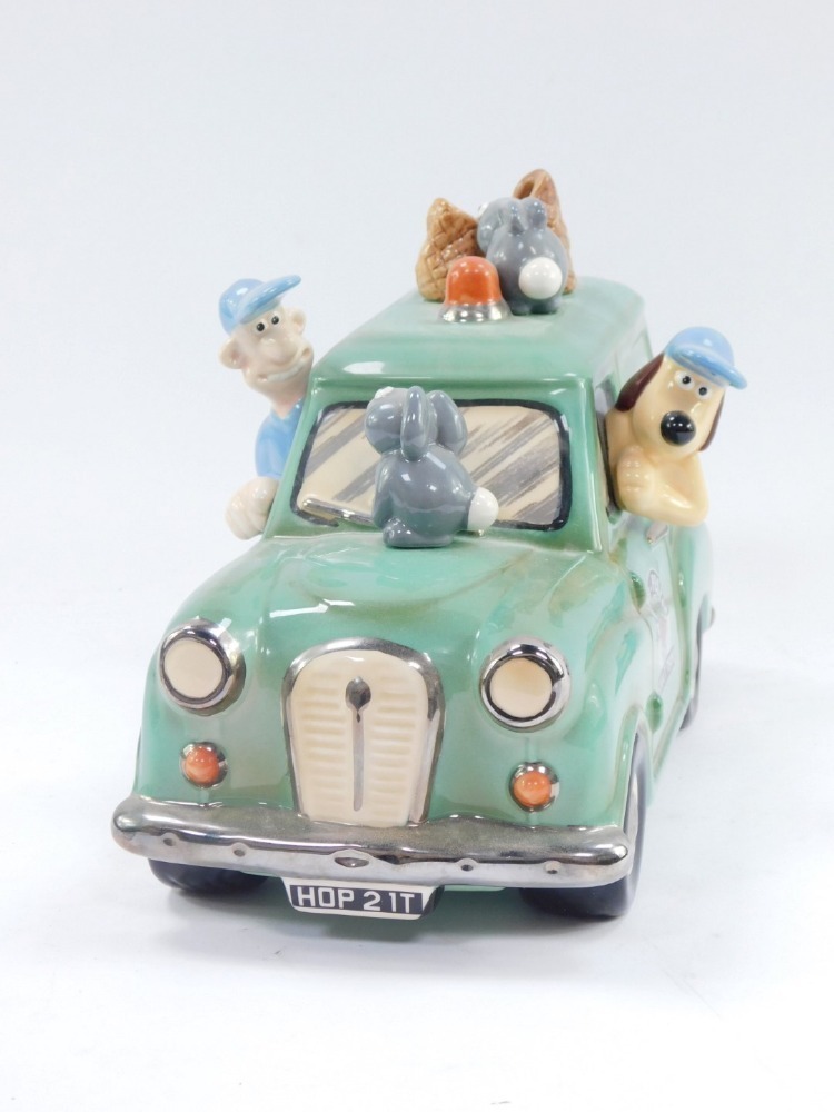 A Wallace and Gromit Border Fine Arts cased van money box, boxed.