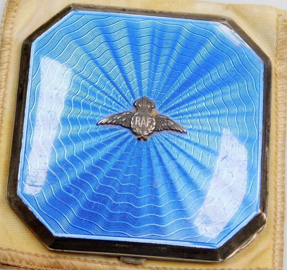 A George V silver and blue guilloche powder compact, the lid ...