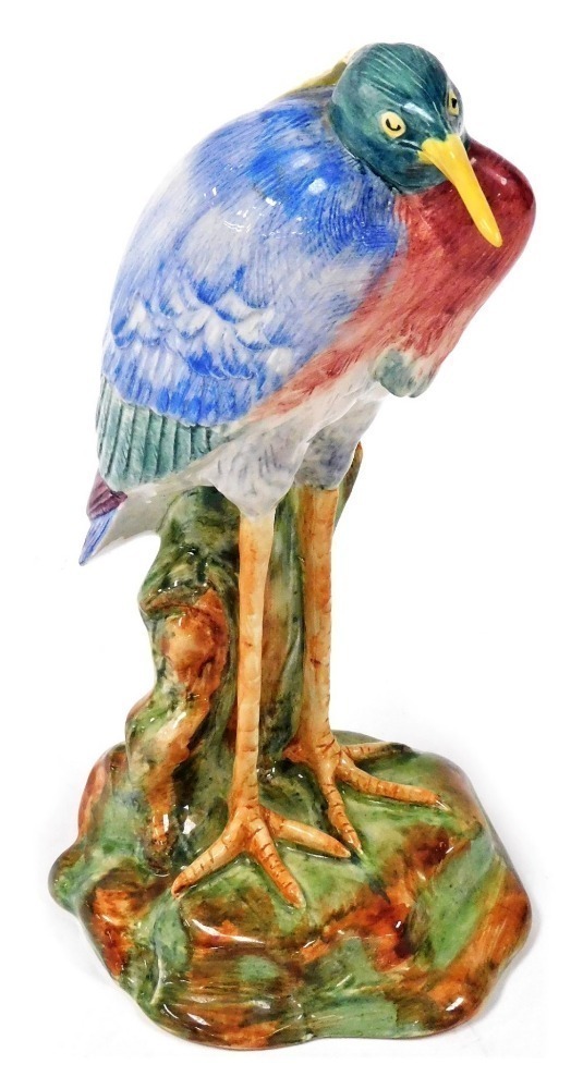 A Wade pottery figure of a heron, printed marks, 19cm high.