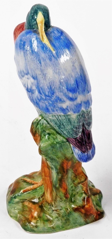 A Wade pottery figure of a heron, printed marks, 19cm high.