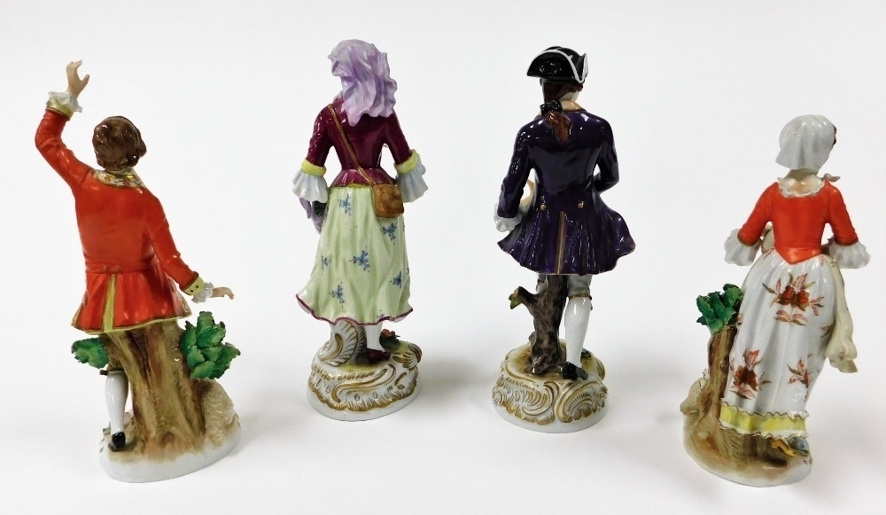 A pair of 20thC Sitzendorf porcelain figures of a shepherd and ...