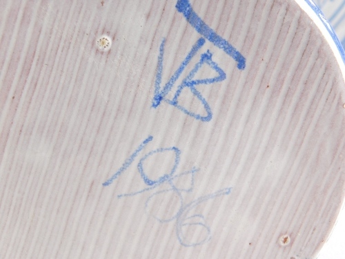 A Studio pottery tyg, with tin glaze, decorated with vases of flowers ...