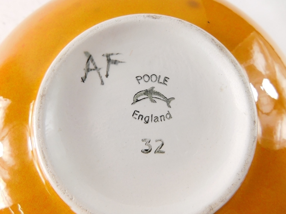 A 20thC Poole pottery Delphis style vase, floral leaf pattern on yellow ...