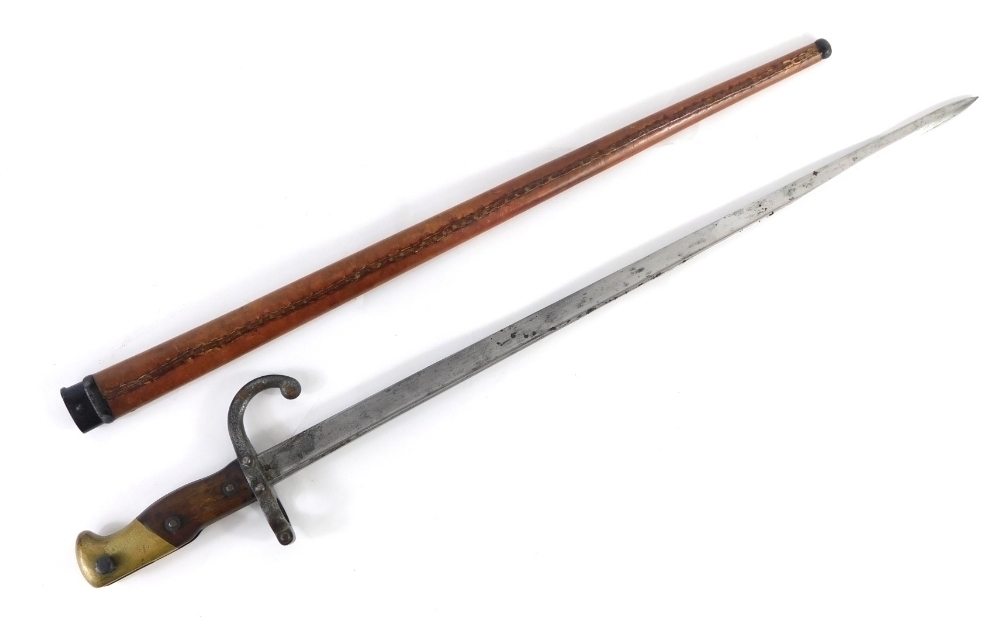 A French model 1874 design bayonet, with brown leather stitched ...