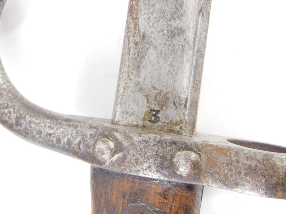 A French model 1874 design bayonet, with brown leather stitched ...