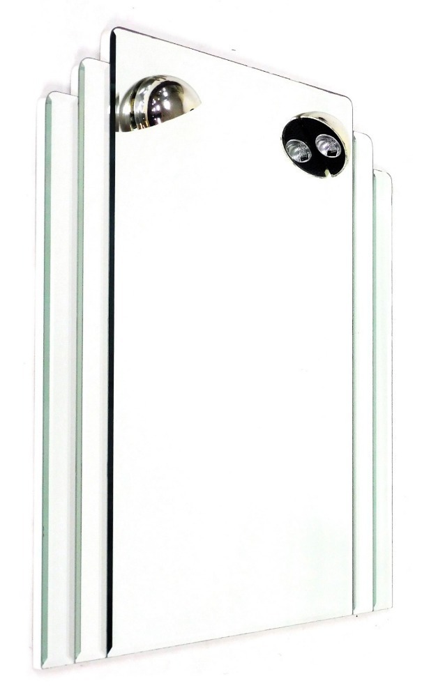 An Art Deco style bathroom wall mirror, with two angled electric lights ...