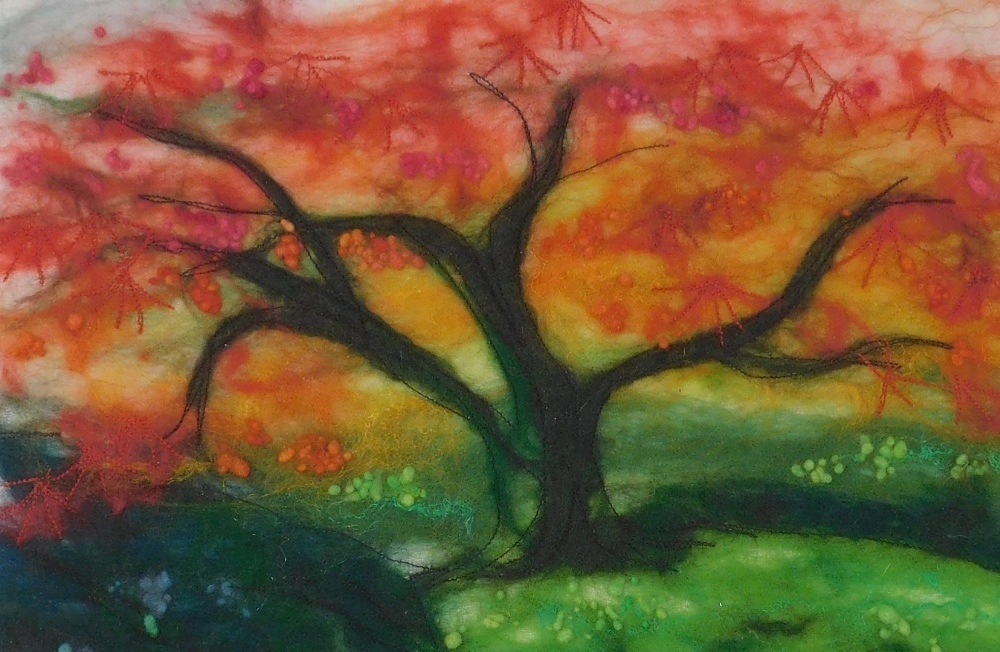 Three felt work pictures, depicting flowering tree, and two seascapes ...