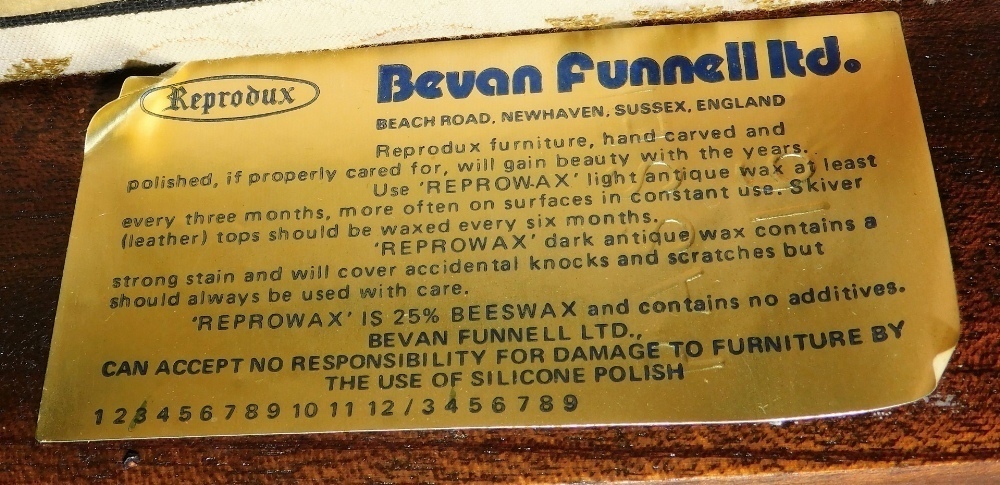 A Bevan Funnell Reprodux mahogany twin pedestal dining table, with one ...