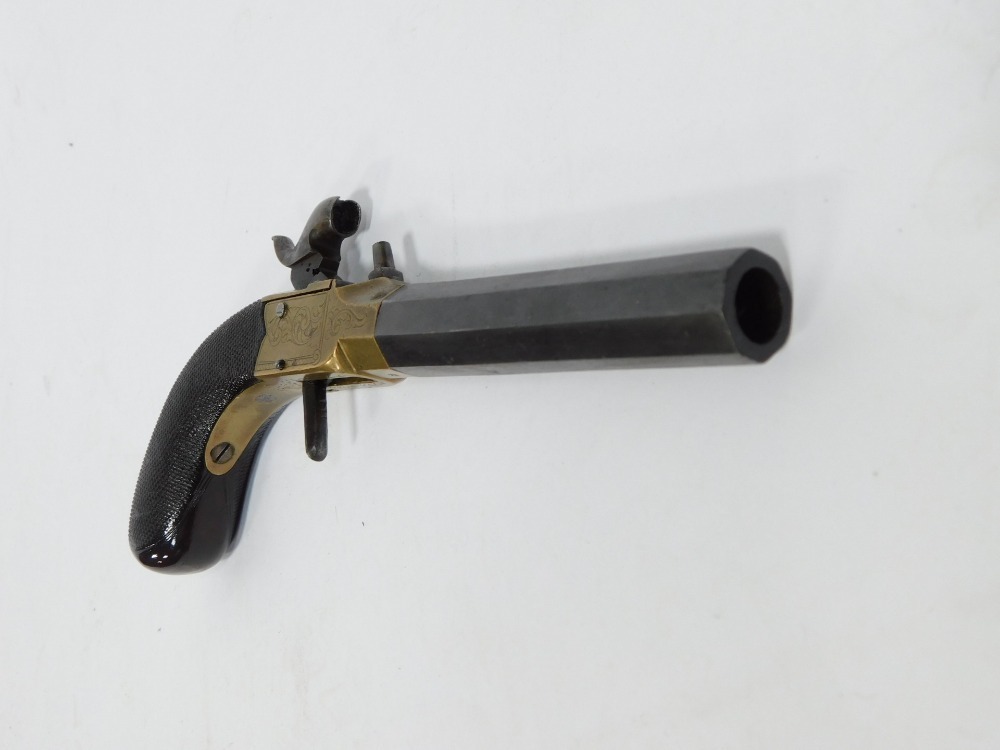 A 19thC box lock percussion pistol, with retractable trigger, octagonal ...