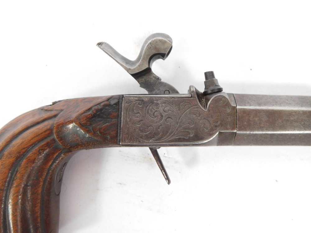 An early 19thC box lock percussion pocket pistol with detachable part ...