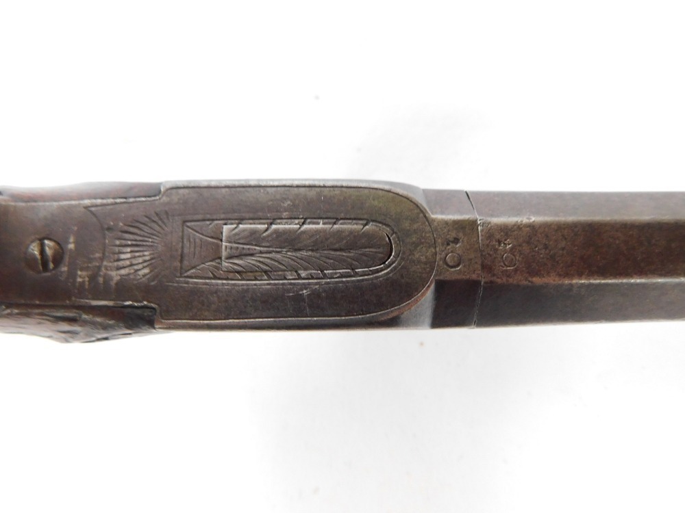 An early 19thC box lock percussion pocket pistol with detachable part ...