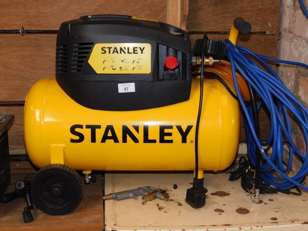 A Stanley 1.5 horsepower 8 bar portable compressor.